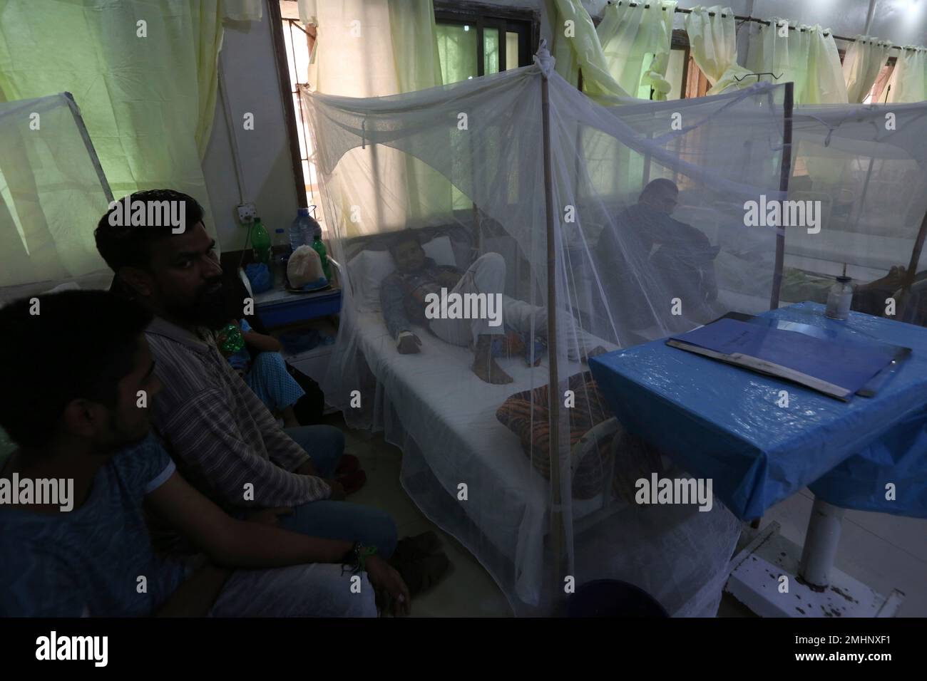 Pakistani patients suffering from dengue fever, a mosquito-borne ...