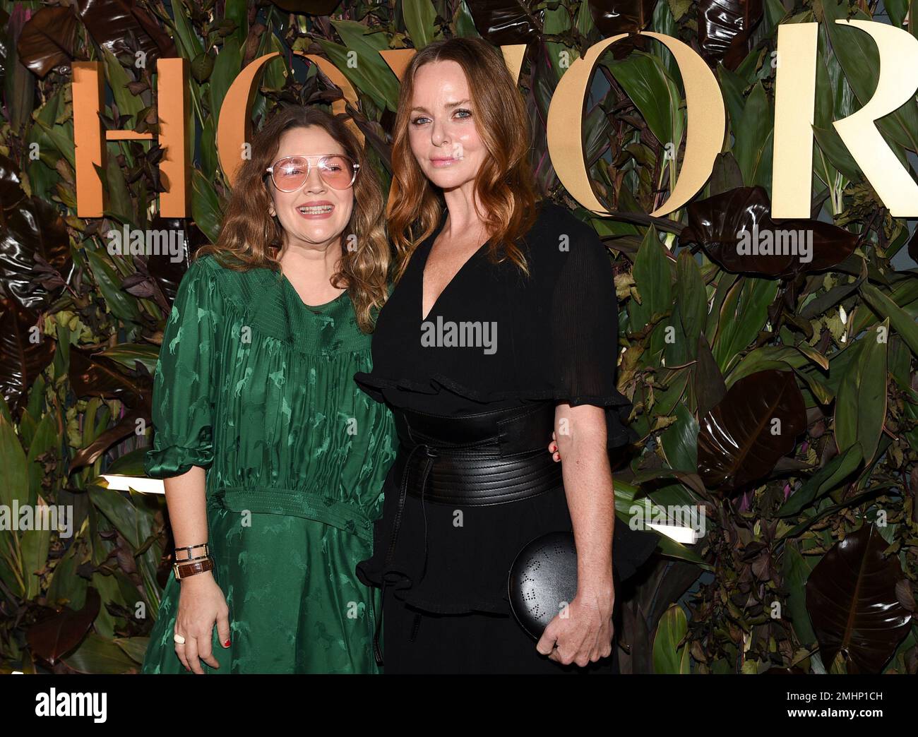 Actress Drew Barrymore, left, and honoree Stella McCartney pose ...