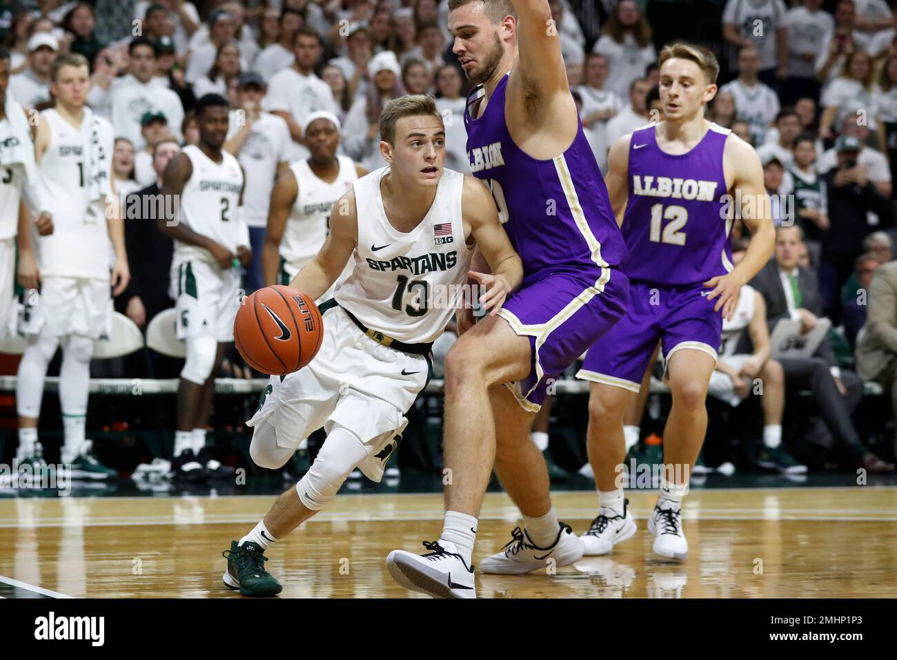 Michigan State guard Steven Izzo (13) drives during the second half of ...