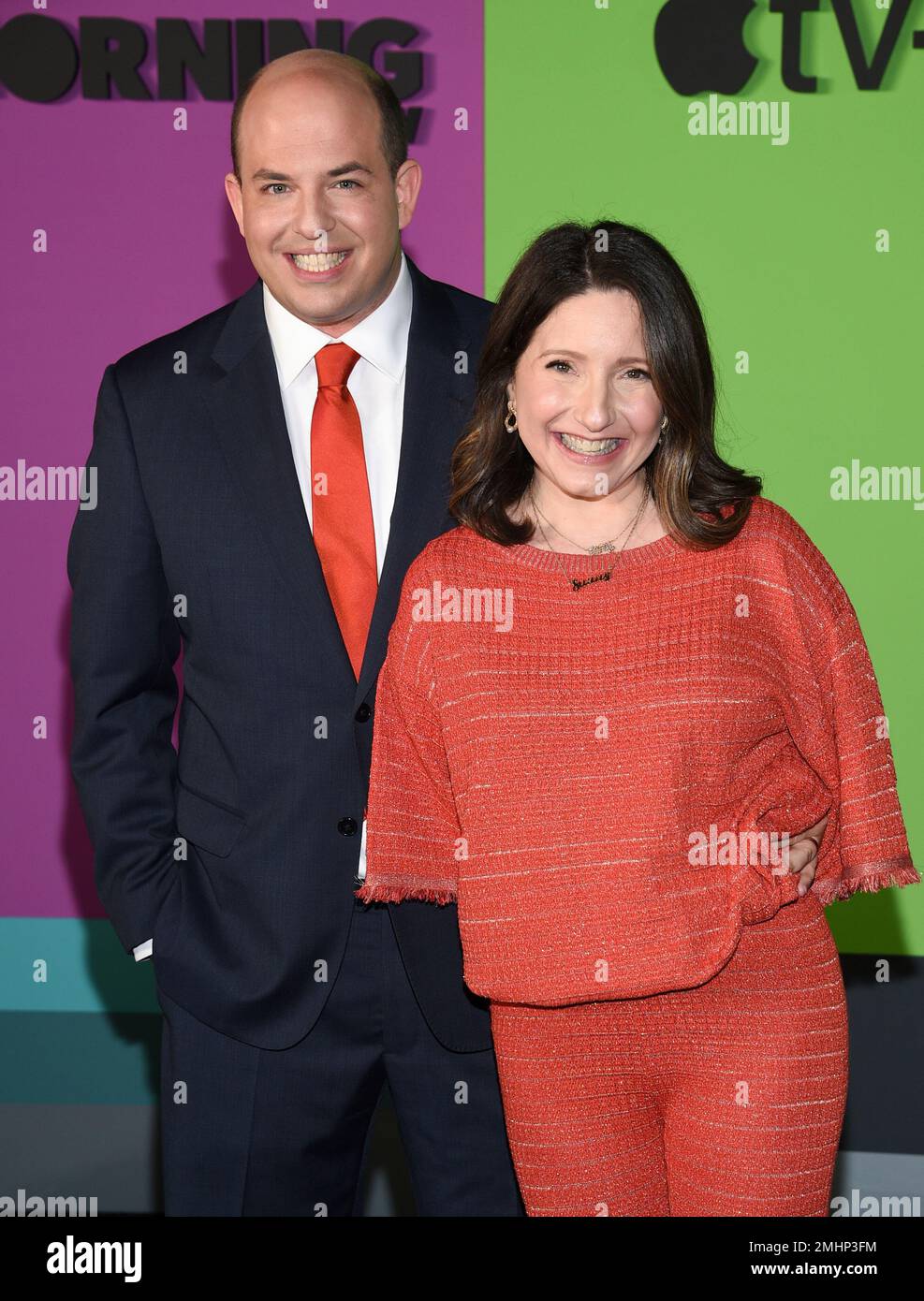 Consulting producer Brian Stelter, left, and wife Jamie Stelter attend ...