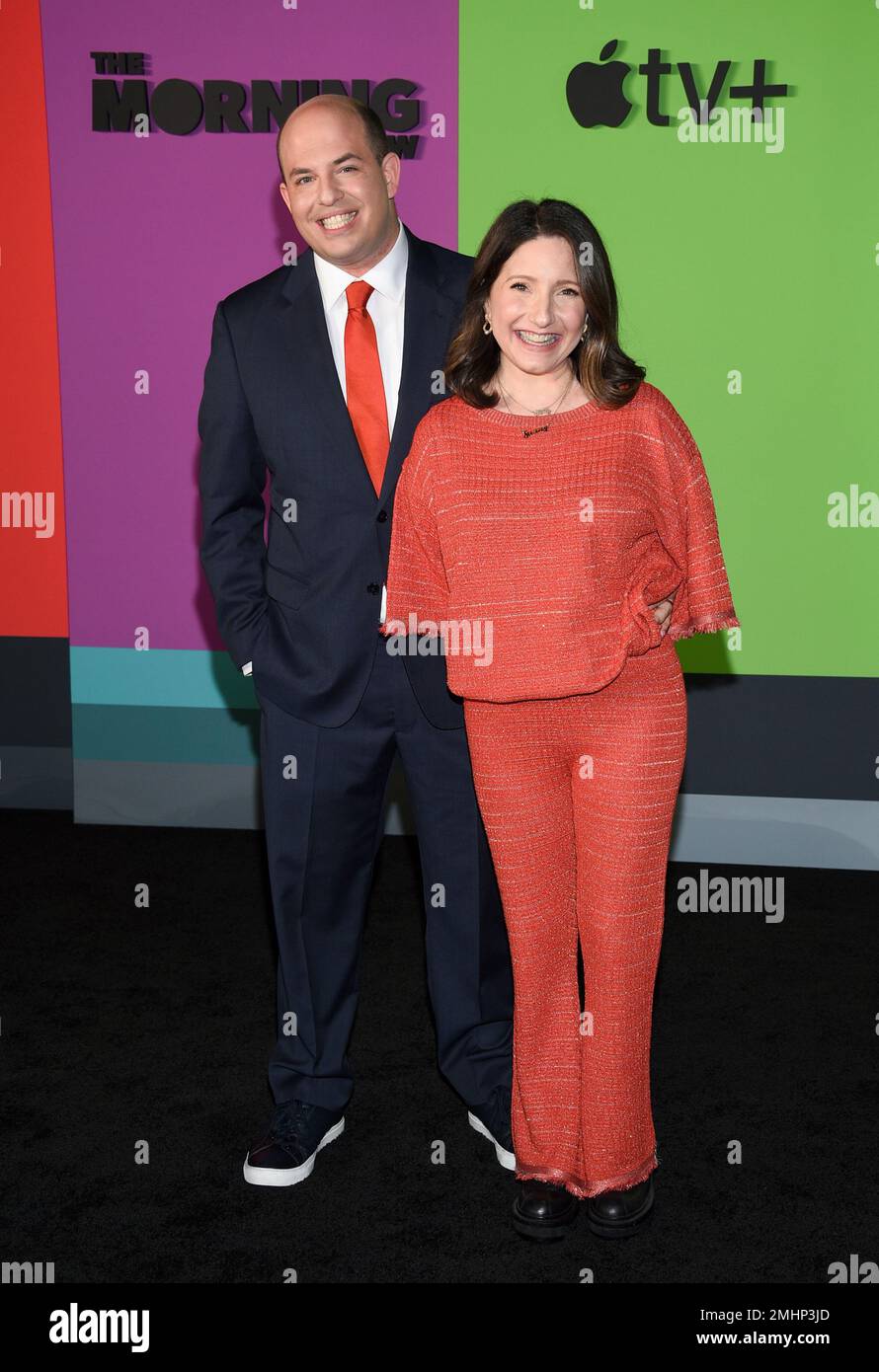 Consulting producer Brian Stelter, left, and wife Jamie Stelter attend ...