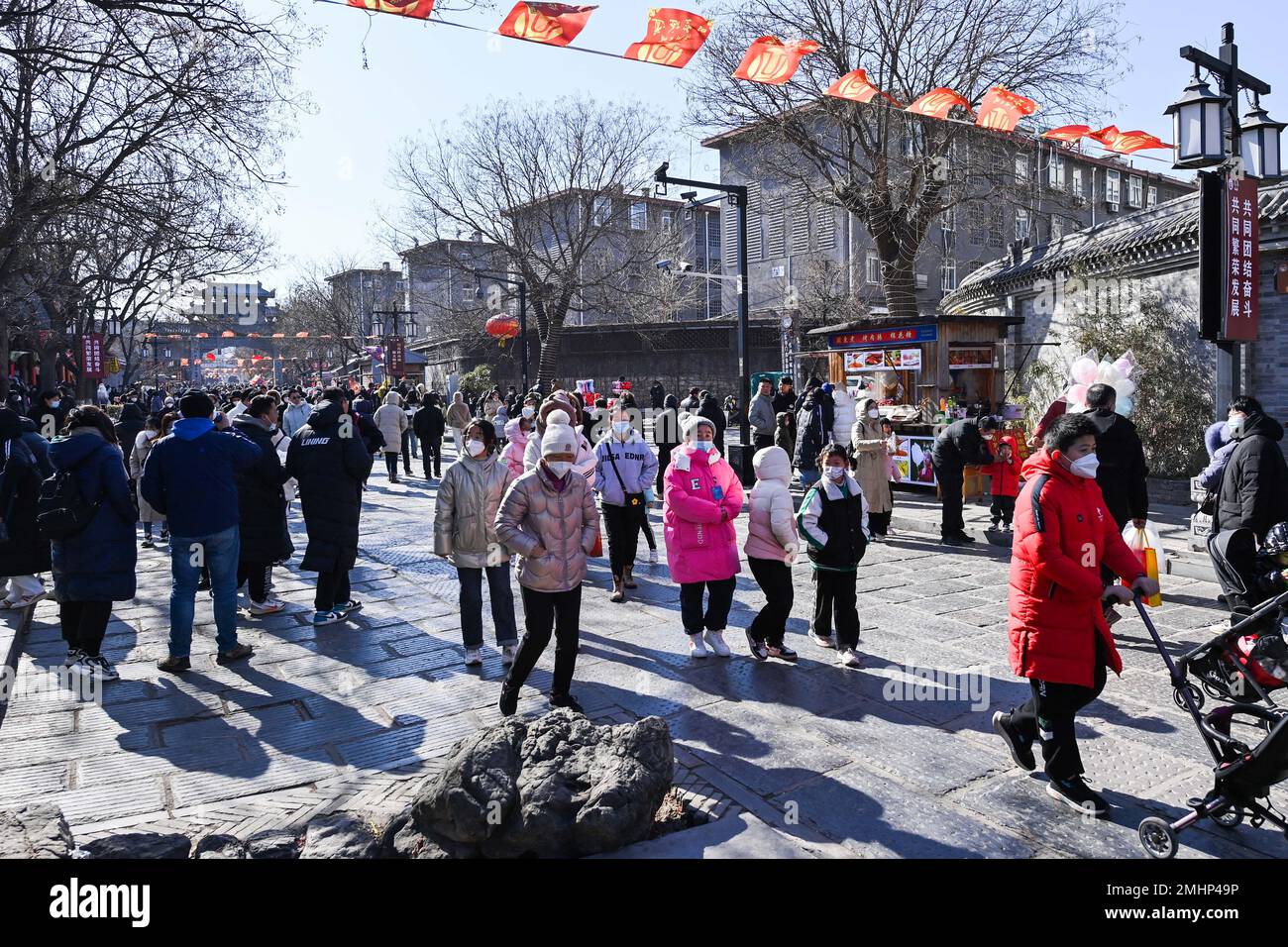 QINGZHOU, CHINA - JANUARY 27, 2023 - Tourists visit the Ancient city of ...
