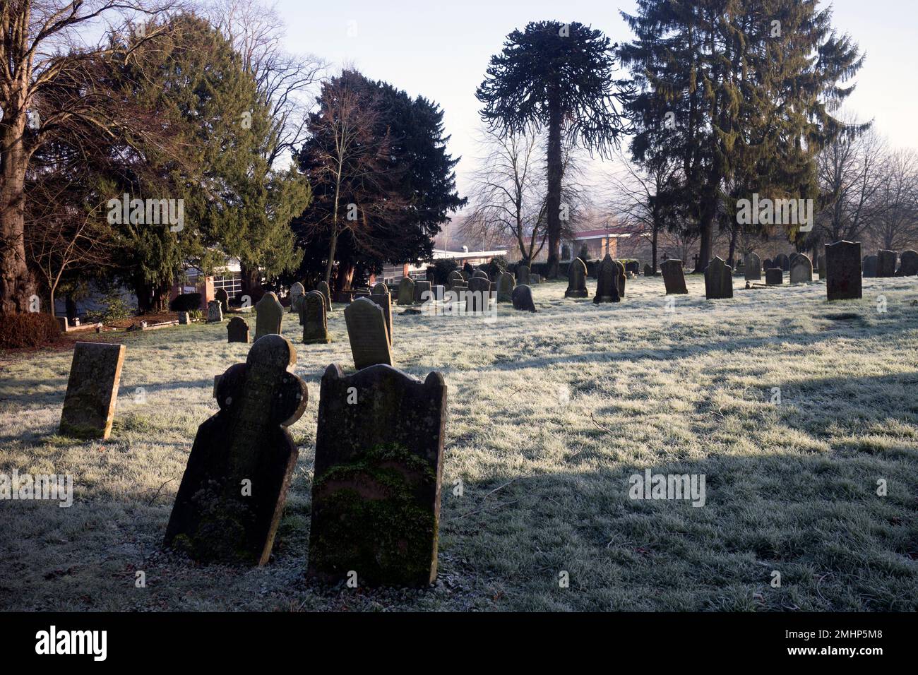 Holy Cross churchyard in winter, Daventry, Northamptonshire, England ...