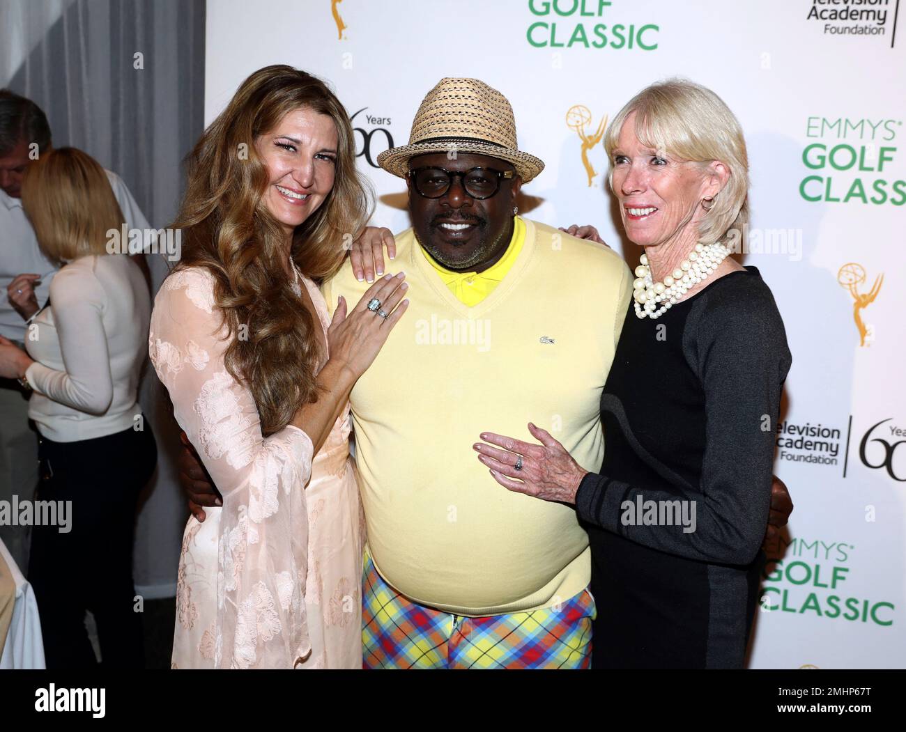 Sonia Kazarova, from left, Cedric the Entertainer, and Deb Coyle attend ...