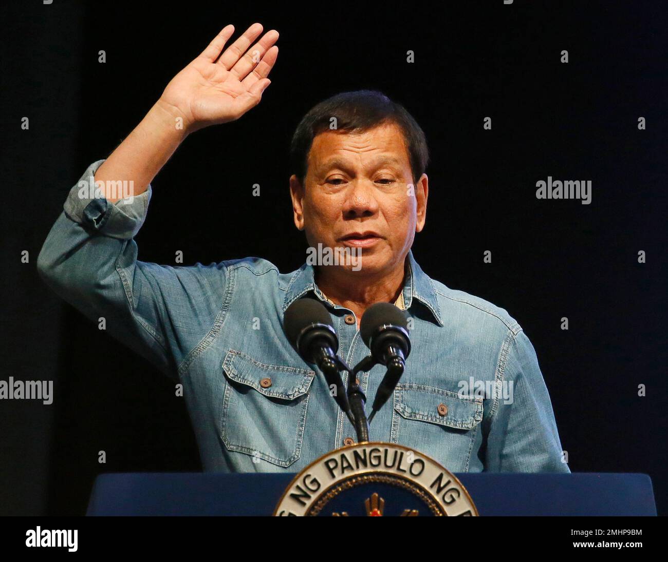 FILE - Philippine President Rodrigo Duterte gestures as addresses ...