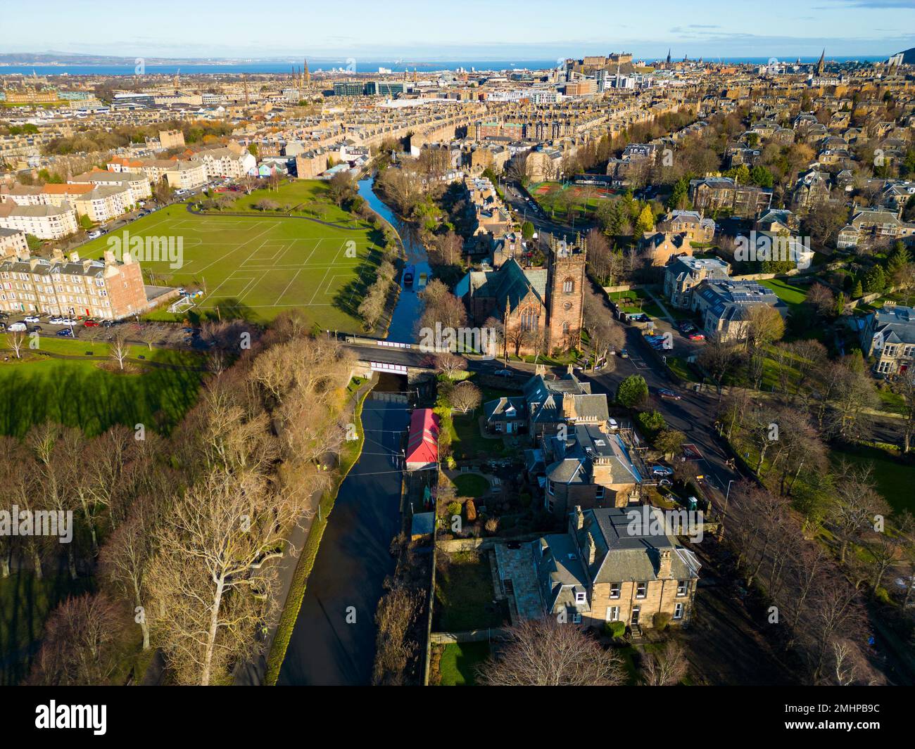Aerial view from drone of Union Canal and Edinburgh skyline at ...