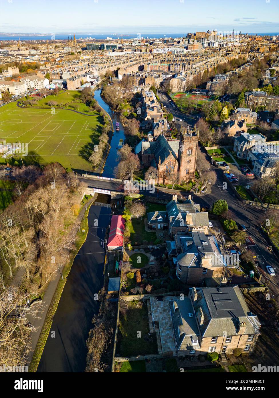 Aerial view from drone of Union Canal and Edinburgh skyline at ...