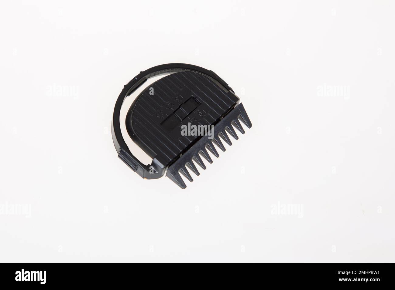 hair trimmer plastic attachment on white background closeup Stock Photo ...