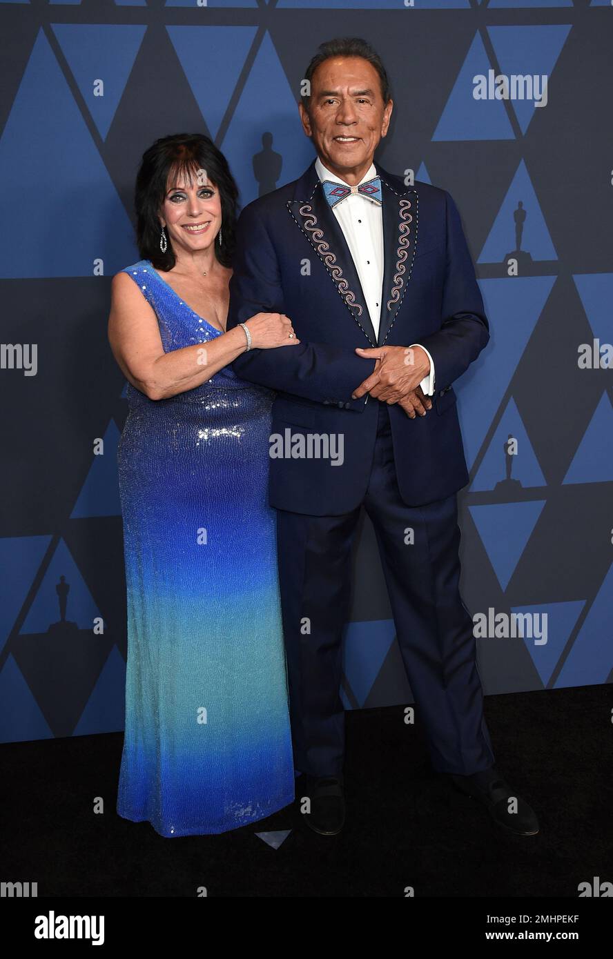 Wes Studi, right, and Maura Dhu Studi arrive at the Governors Awards on ...