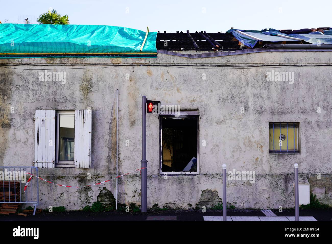 Exterior of accidental burnt by fire home building Burned house wall in ...