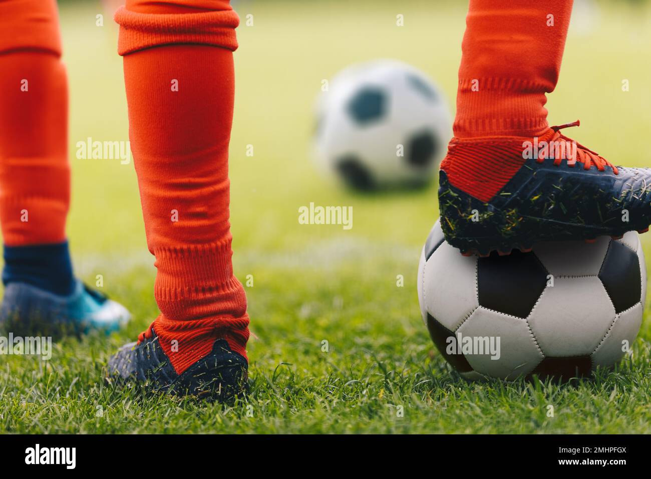 Football players in training, action at the stadium during a football ...