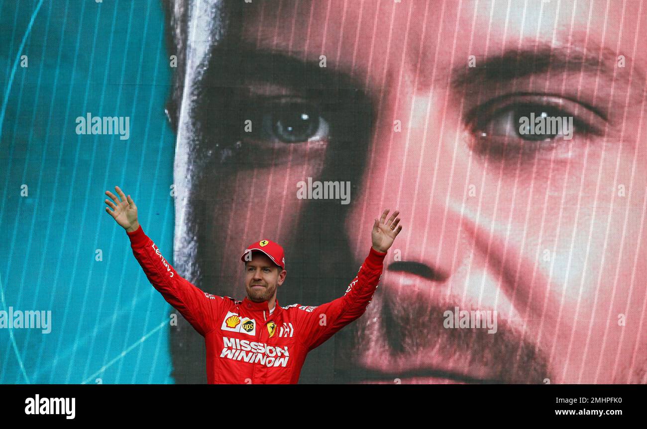 Second place finisher Ferrari driver Sebastian Vettel, of Germany ...