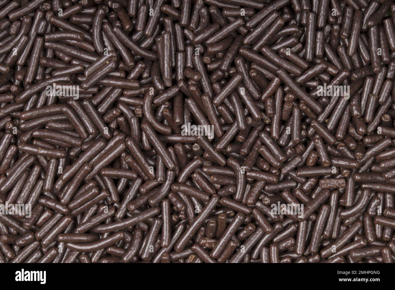Chocolate sprinkles texture, food background Stock Photo - Alamy