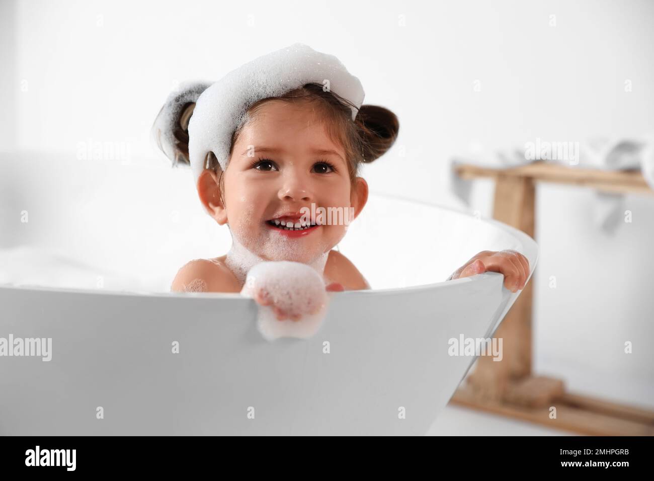 Cute little girl taking bubble bath at home Stock Photo - Alamy Cute little girl taking bubble bath at home Stock Photo - Alamy
