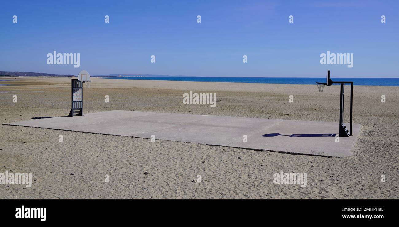 basketball hoop on the playground basket ball court on sand beach of ...