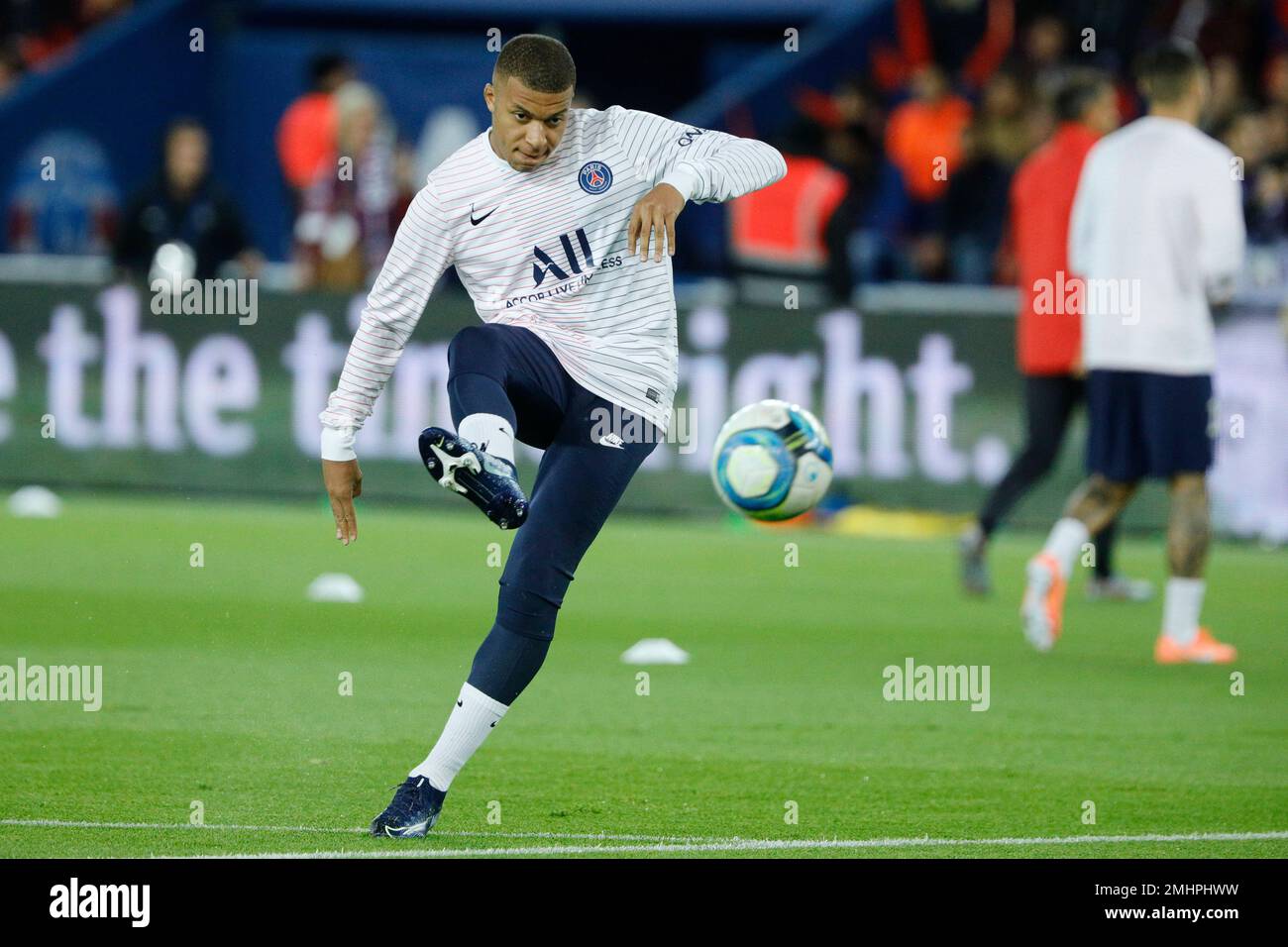 PSG's Kylian Mbappe kicks the ball during warmup ahed of the French ...
