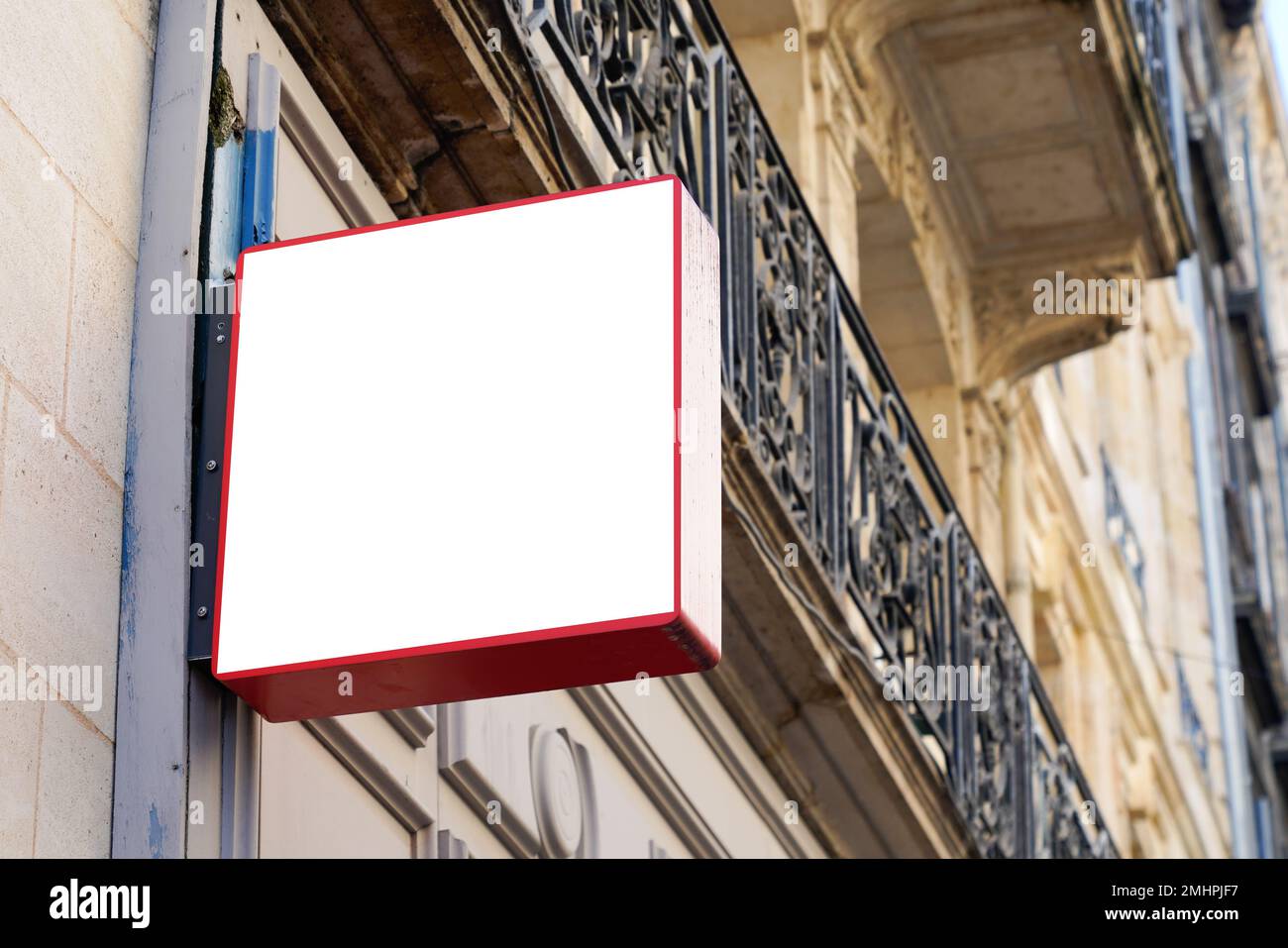Blank mock up panel store empty white signboard on facade shop wall ...