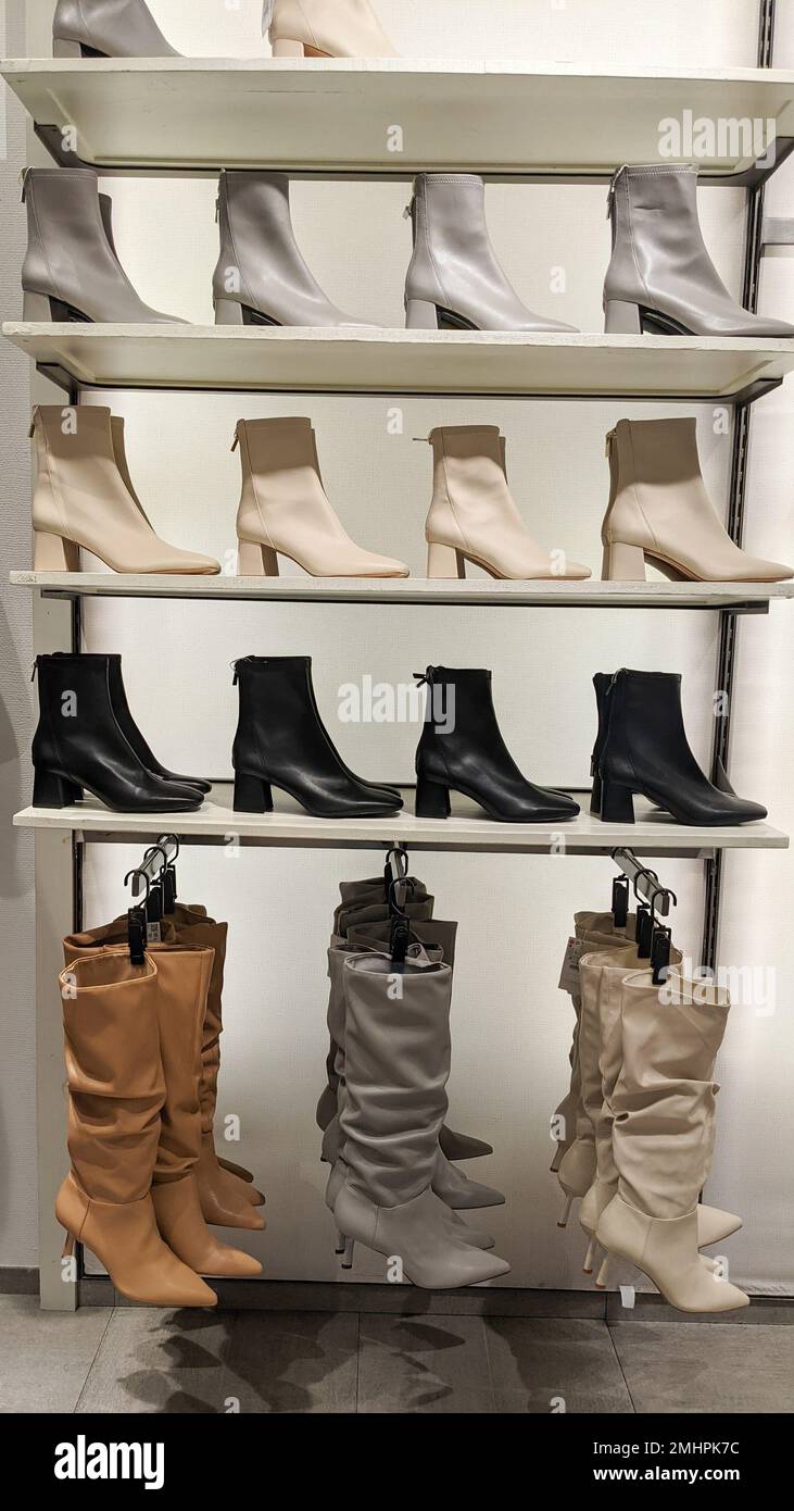 Collection store of new female fashion women shoes on shelves in shop ...