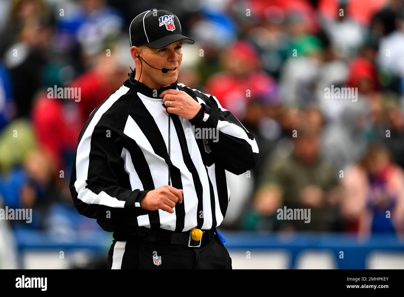 A referee works during the first half of an NFL football game between ...