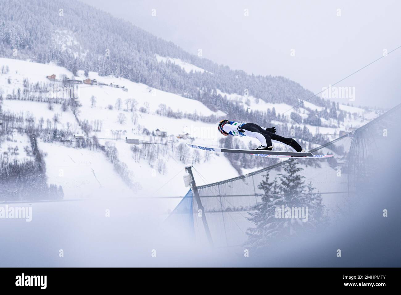 Halvor Egner Garnered of Norway soars through the air during the trial ...