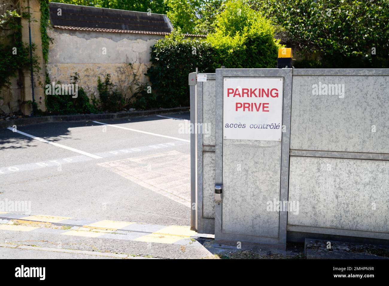 parking prive sign text in french door steel portal open means parking ...