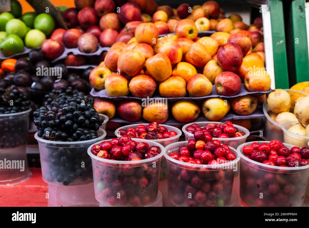 Varieties of fruits and vegetables stacked and ready for sale. Organic ...