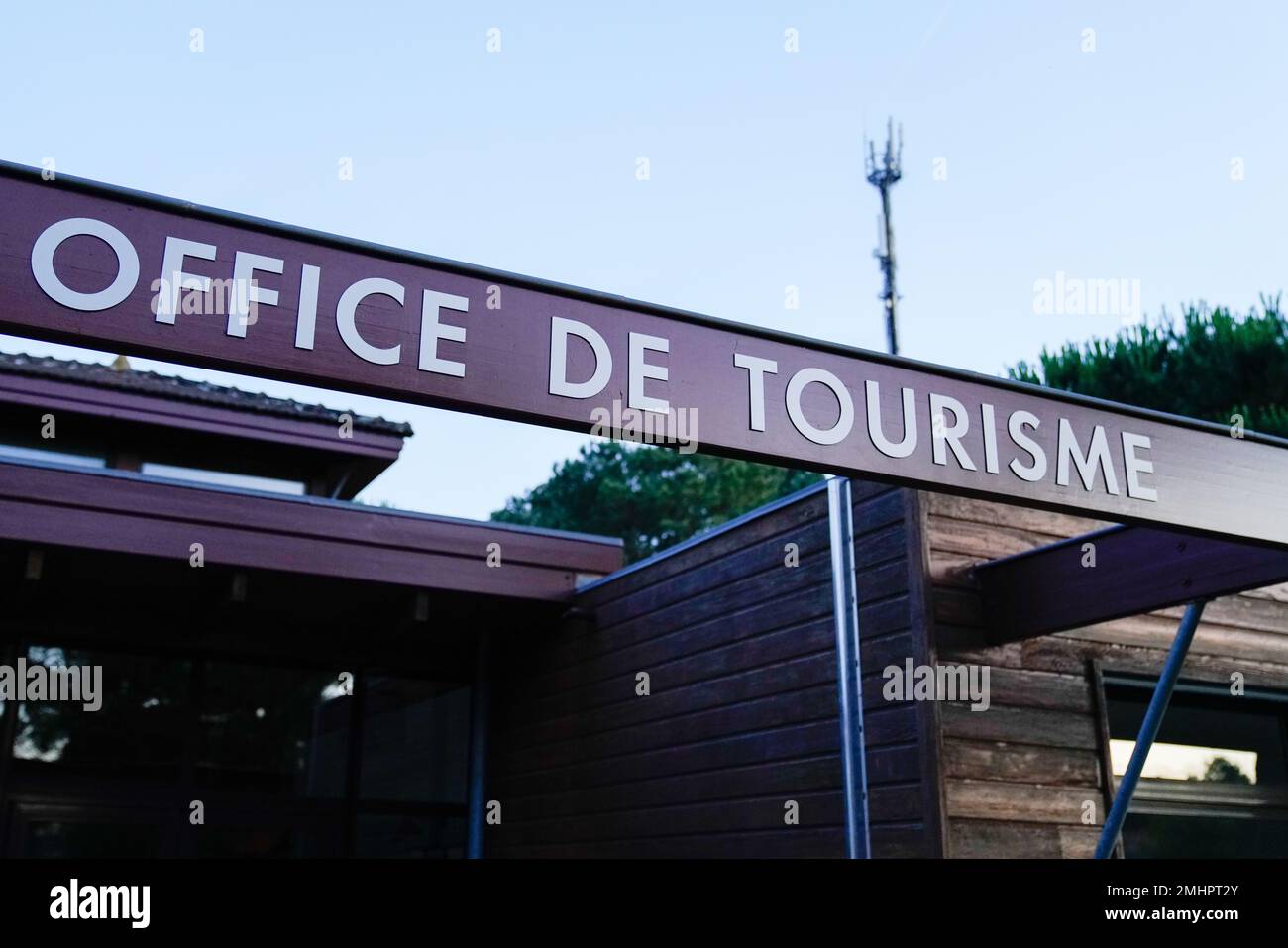 office de tourisme sign text in French means tourism office on wall ...