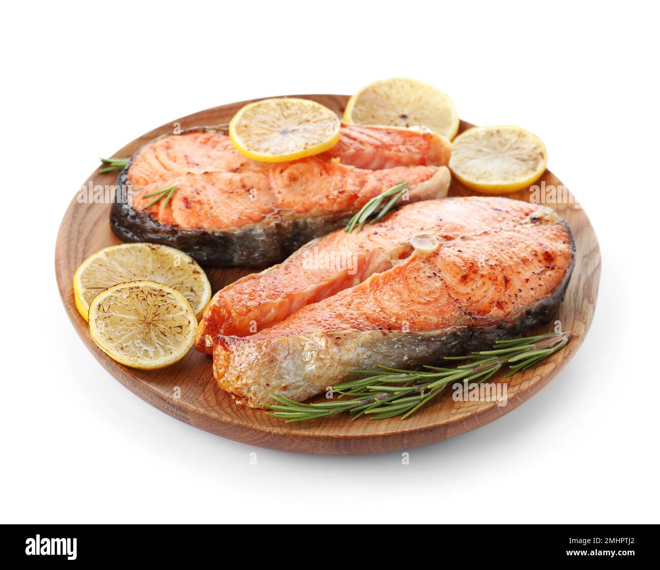 Wooden plate with tasty cooked red fish isolated on white Stock Photo ...