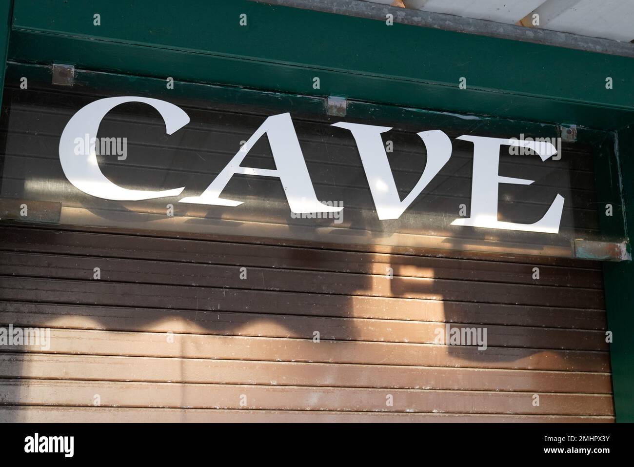 cave sign letters wine bar showcase outdoor Cafe Mockup Stock Photo - Alamy