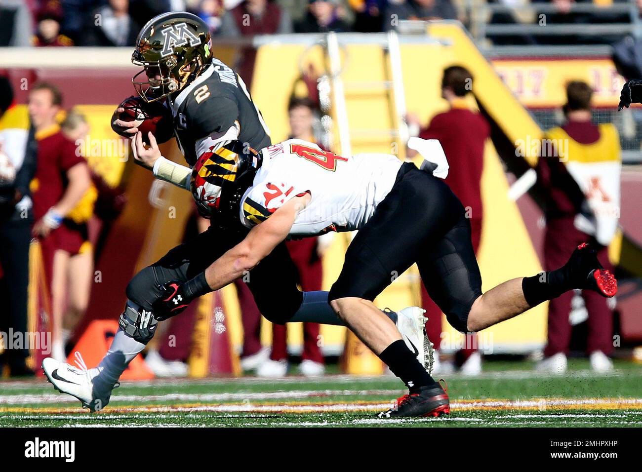 Minnesota quarterback Tanner Morgan (2) runs with the ball against ...