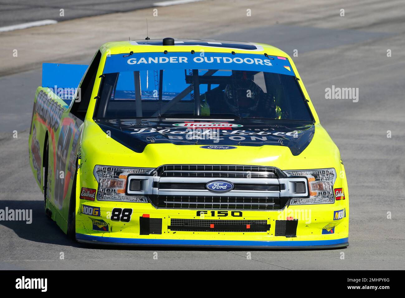 Matt Crafton (88) makes the turn in turn four during the NASCAR Truck ...