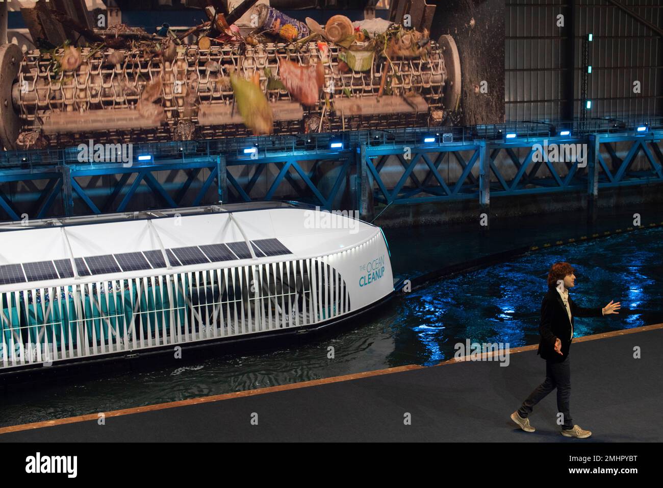 Young Dutch inventor Boyan Slat, right, unveils the Interceptor, in ...
