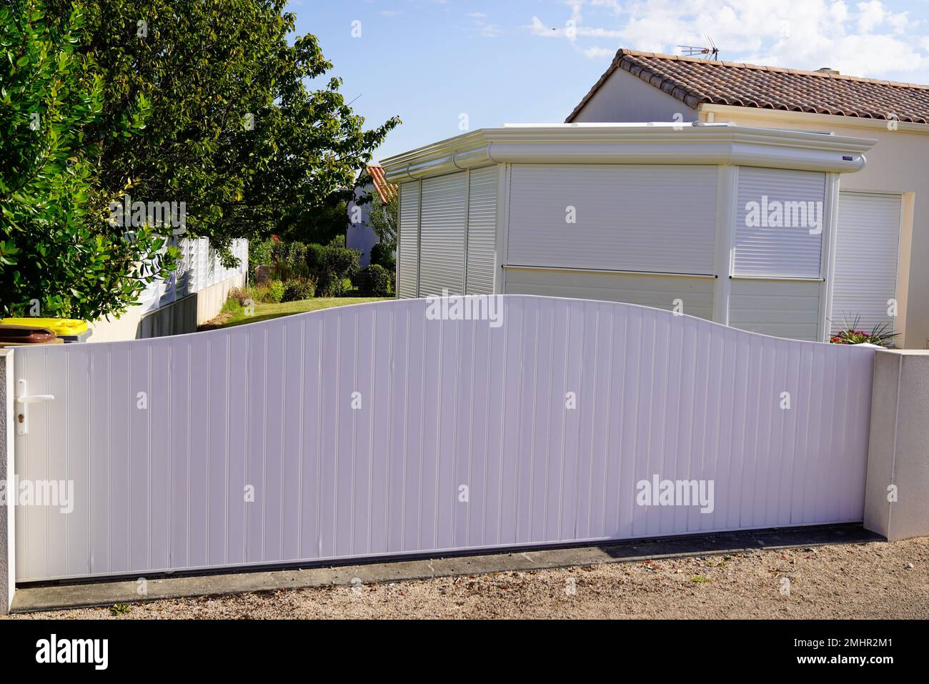 modern gate in white pvc plastic with blades of suburbs house Stock ...