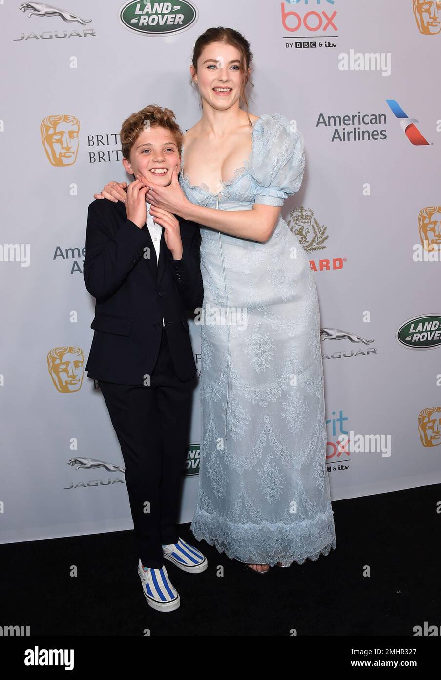 Roman Griffin Davis, left, and Thomasin McKenzie arrive at the BAFTA ...