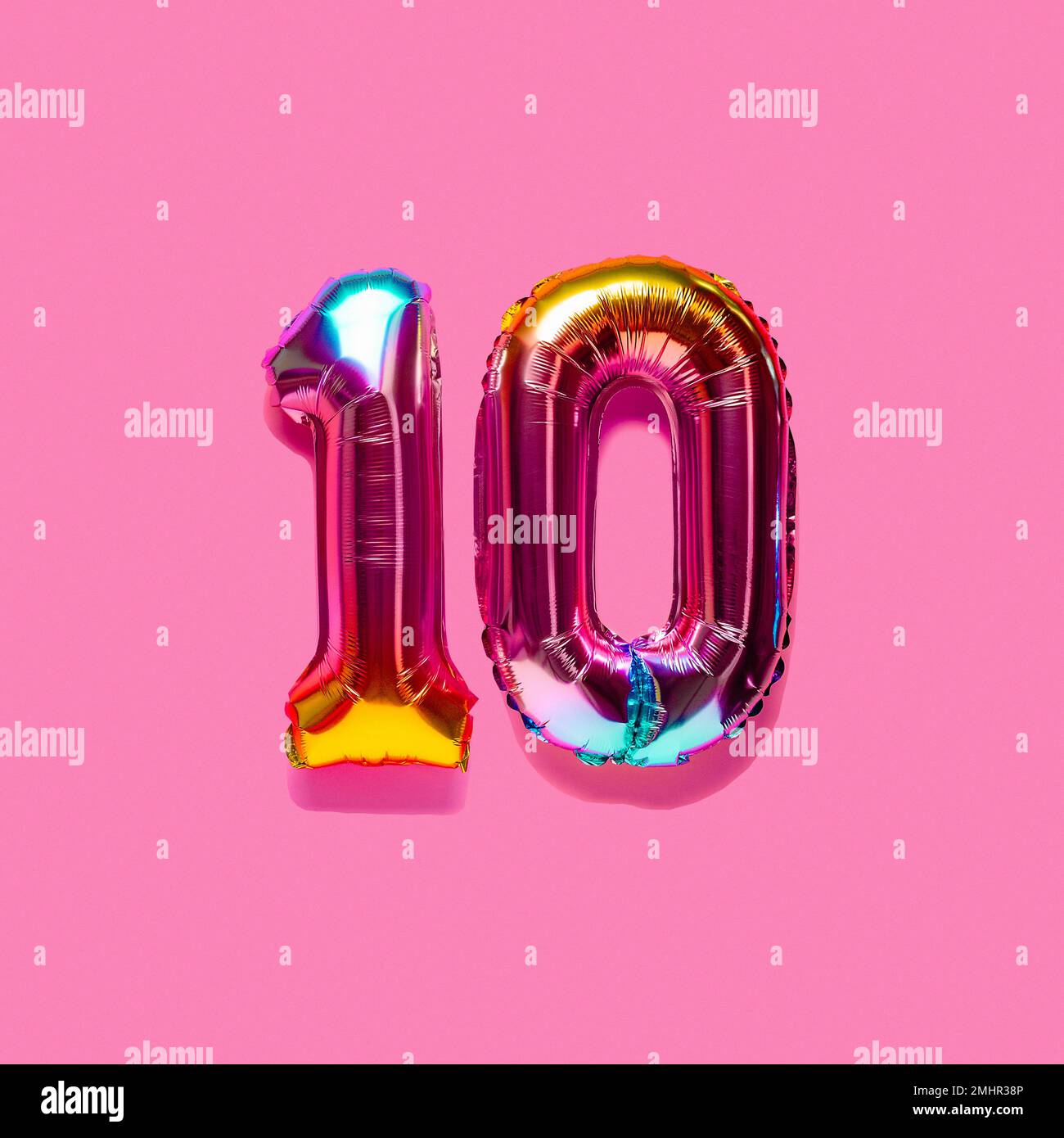 Rainbow foil balloon number, digit ten. Top view. Colored numeral on ...