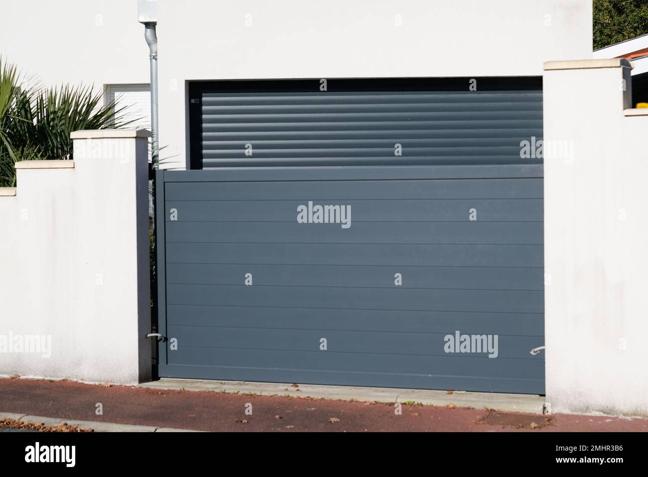 sliding portal large metal gate grey fence on suburb street house door ...