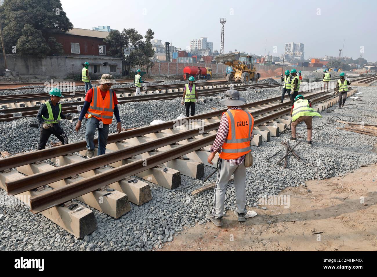 Dhaka, Bangladesh - January 27, 2023: Workers are working to connect ...