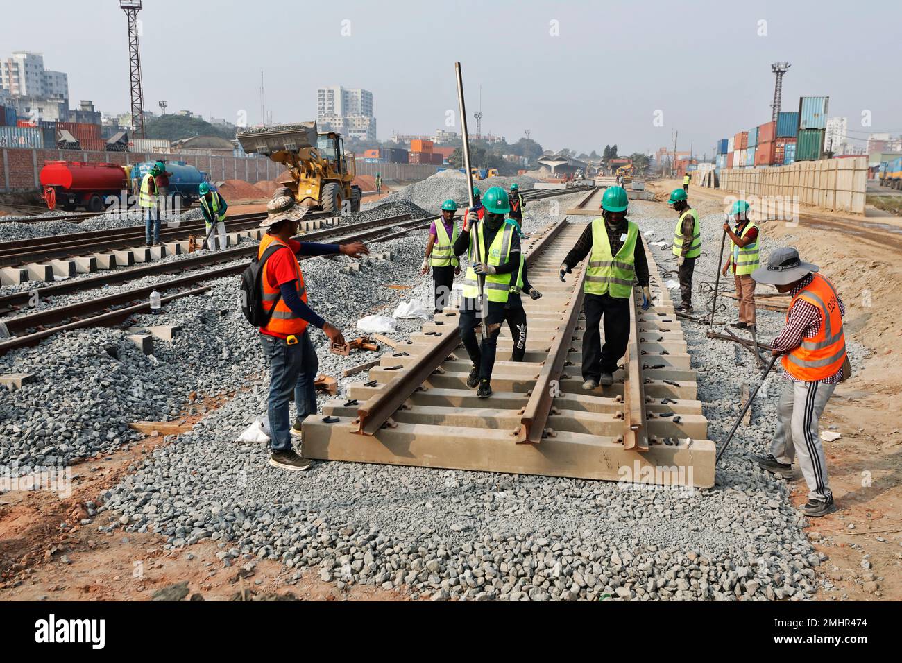 Dhaka, Bangladesh - January 27, 2023: Workers are working to connect ...