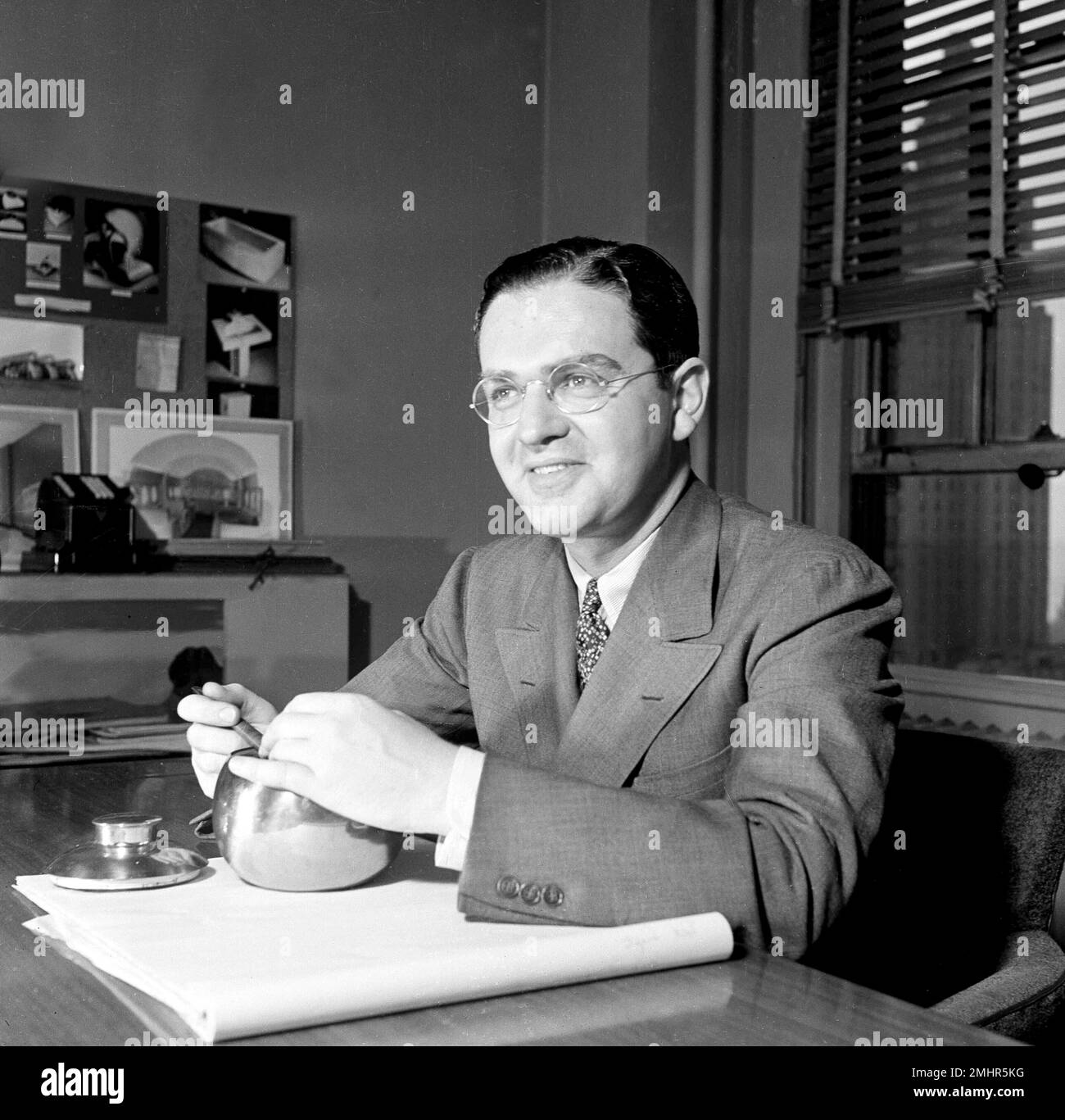 Industrial designer Henry Dreyfuss, designer of the new streamlined ...