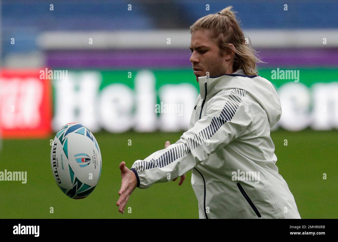 South Africa's rugby player Faf de Klerk prepares to kick the ball ...