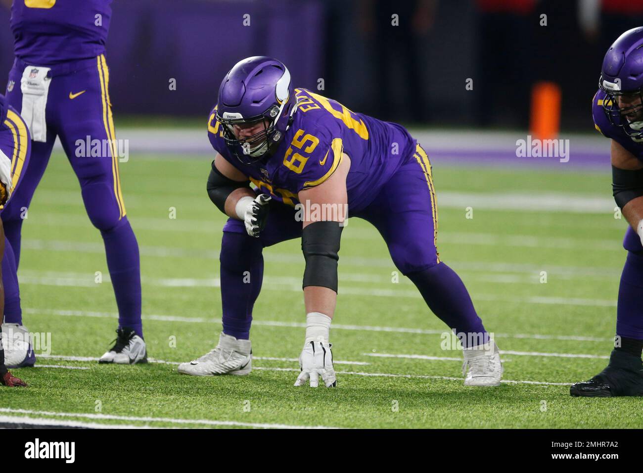Minnesota Vikings offensive guard Pat Elflein (65) gets set on the line ...