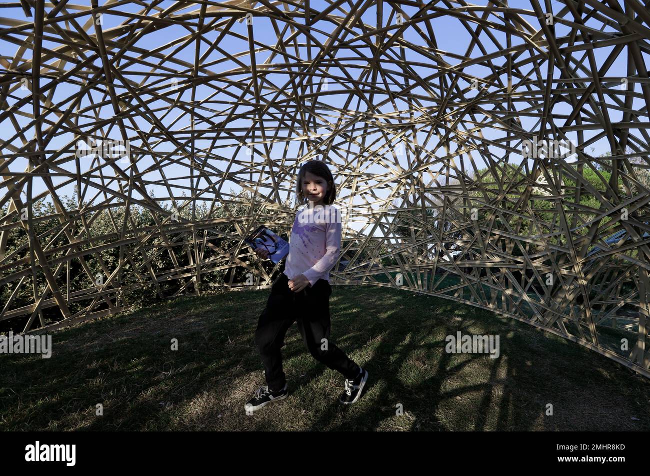 Eight-year-old Neve Davey runs through an installation called ...