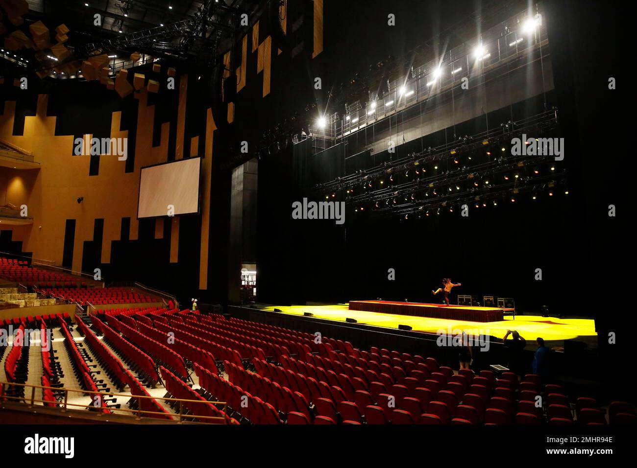 A man stands on stage at the concert hall inside the Seminole Hard Rock ...