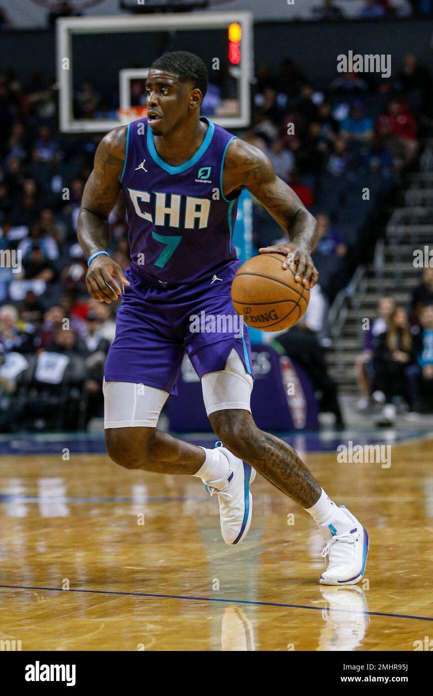 Charlotte Hornets guard Dwayne Bacon brings the ball up court against ...