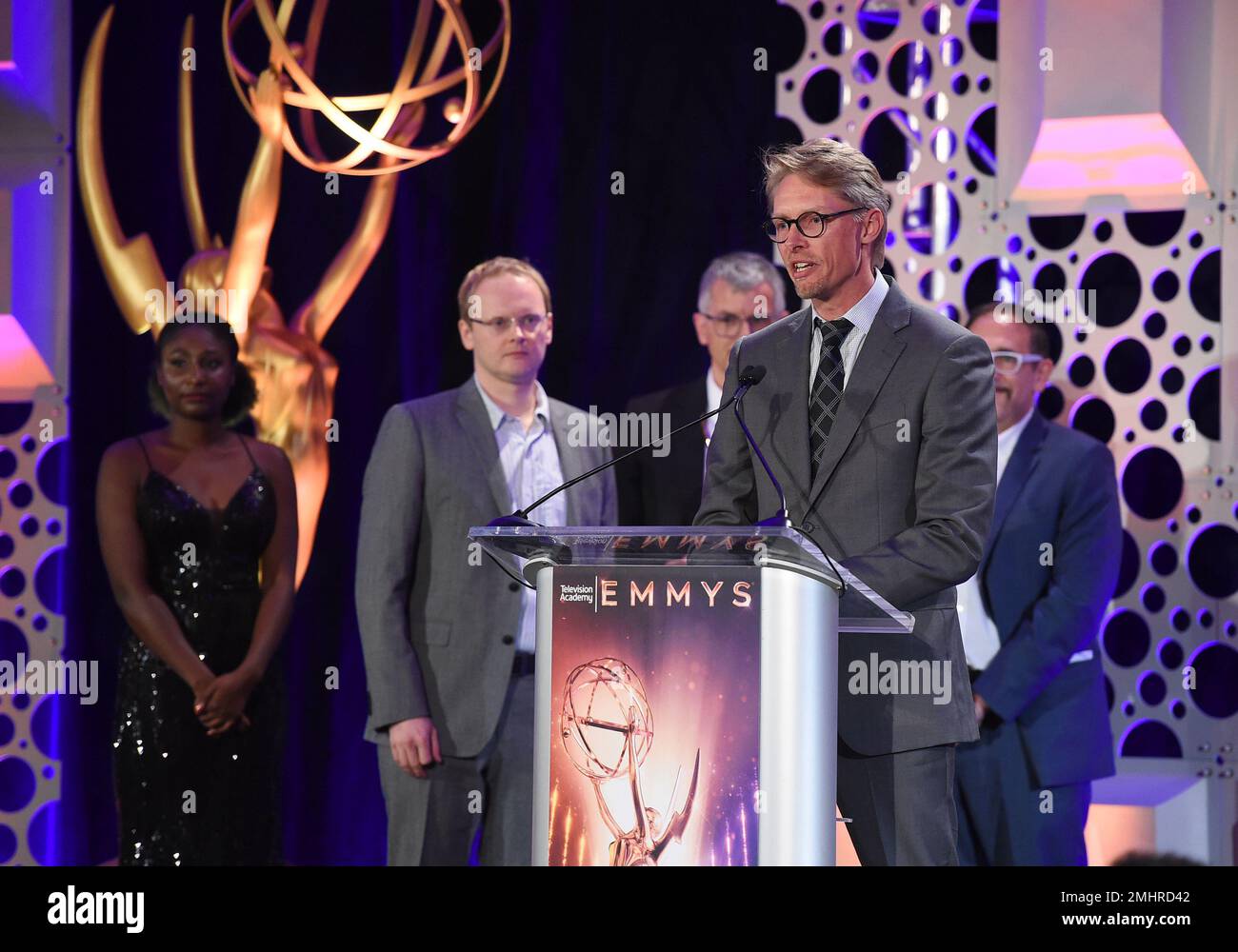 John-Paul Smith, and from left, Dr. Phillip McLauchlan, Alan Jaenicke ...