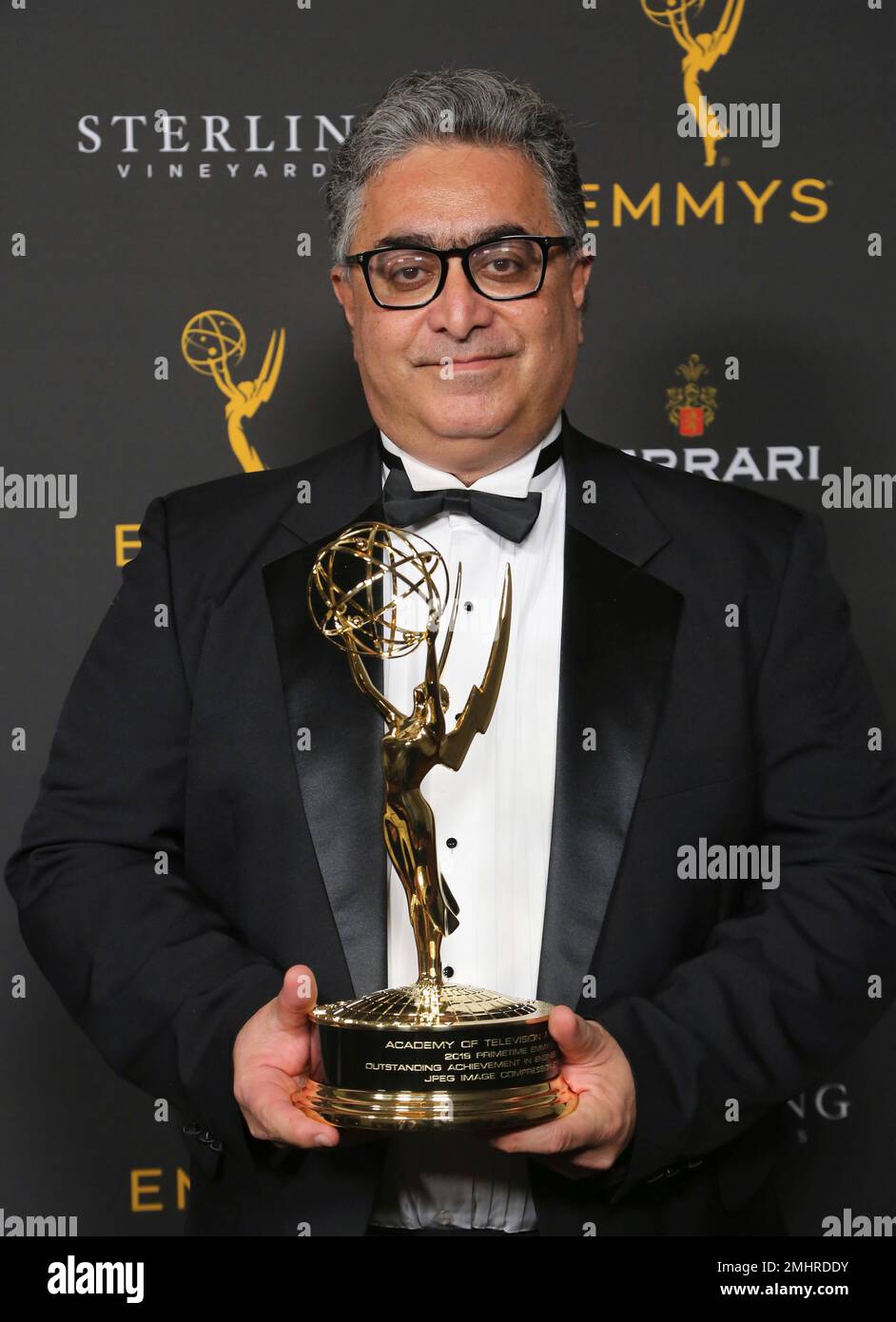 Touradj Ebrahimi of JPEG poses with the Engineering Emmy Award at the ...