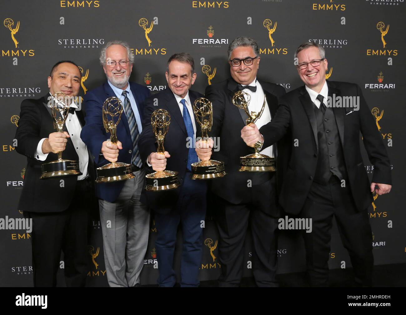 Teruhiko Suzuki, and from left, Craig Wallace, Istvan Sebestyen ...