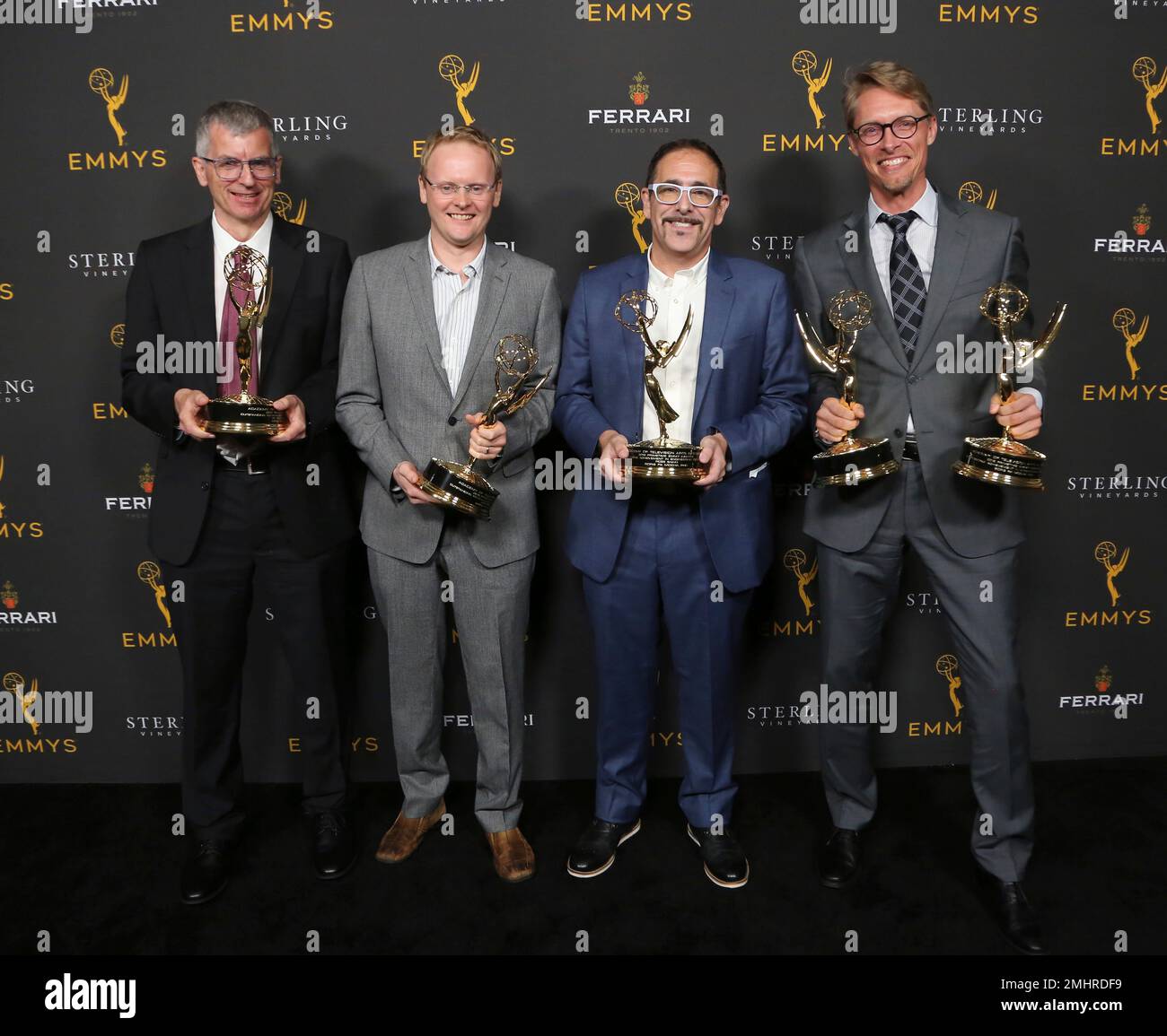 Dr. Phillip McLauchlan, and from left, John-Paul Smith, Ross Shain, and ...