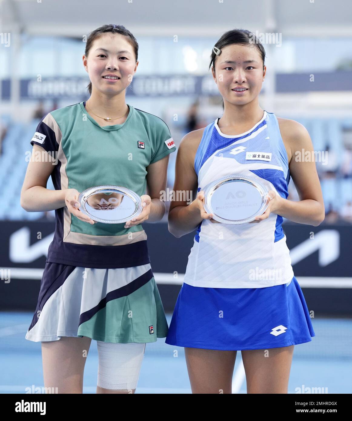Japanese pair Hayu Kinoshita (L) and Sara Saito pose with their silver ...