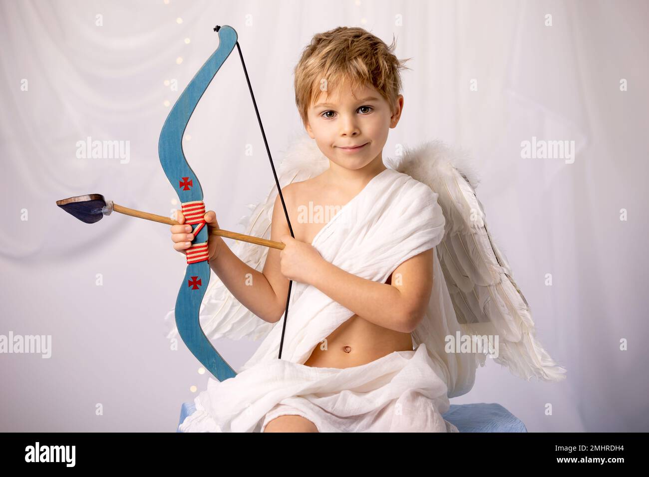 Little Boy With Bow And Arrow